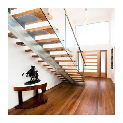 中国 Factory wood metal stair central stringer straight solid wood staircase 販売のため