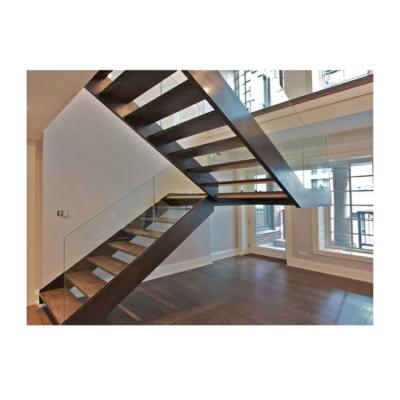 Cina Professional customized wood step staircase design tempered glass baluster stair in vendita