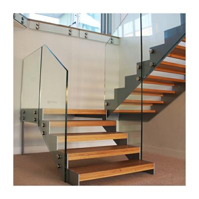 Cina Good quality glass railing straight stair red wooden tread staircase in vendita