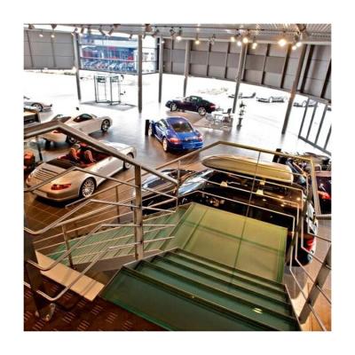 Cina Steel staircases design space saving glass staircase indoor center beam straight staircase in vendita