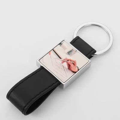 China Custom Blank Sublimation Metal Keychain With Leather Strap For Sublimation Heat Transfer Printing for sale