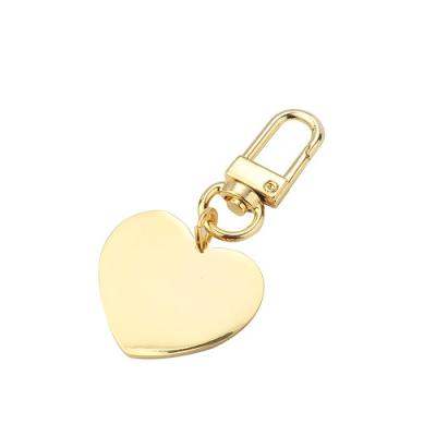 China Blank Round And Heart Shape Sublimation Key Ring Bag Hanging Ornaments Accessories for sale