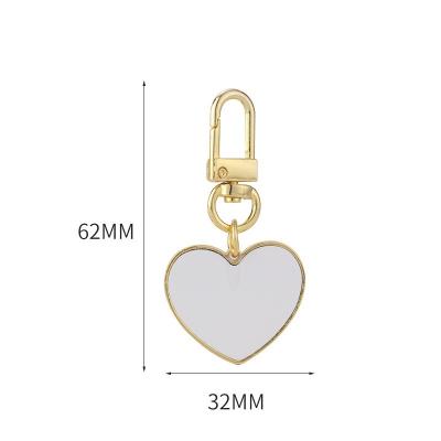 China Blank Round And Heart Shape Sublimation Key Ring Bag Hanging Ornaments Accessories for sale