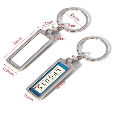 China Double Sided Sublimation Key Chains Blanks Car Keychain Tags With Printable Aluminum Sheet for sale