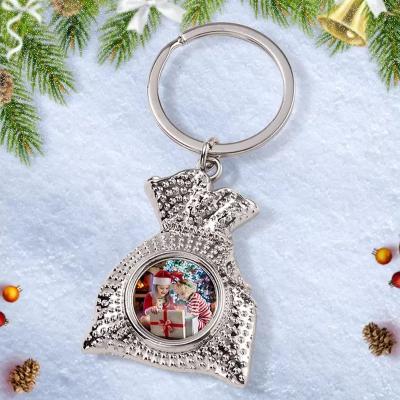 China Custom Logo Keychains DIY Creative Sublimation Gift Bag Keychain Pendant Heat Transfer Metal Blank Round Photo Keyring for sale
