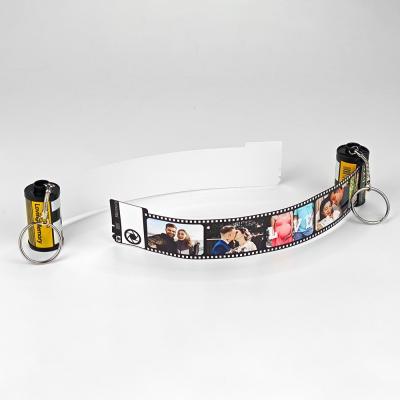 China Diy Sublimation Blank Memory Film Keychain Loving Memory Photo Film Roll Double Sided Sublimation Memory Keychains for sale