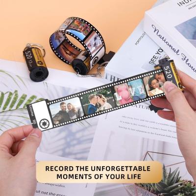 China Diy Sublimation Blank Memory Film Keychain Loving Memory Photo Film Roll Double Sided Sublimation Memory Keychains for sale