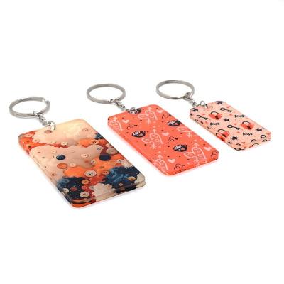 China DIY Personalized Sublimation Blank Acrylic Keychains For Sublimation Photos Printing for sale