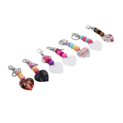 China Heart Shape Sublimation Acrylic Keychains Blanks 120*40mm Customizable for sale
