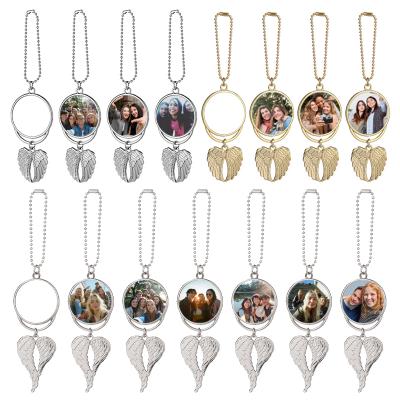 China Aangepaste metalen auto hangende ornamenten Sublimatie Dubbelzijdige foto DIY Engelenvleugels Auto Interieur Ornamenten Te koop