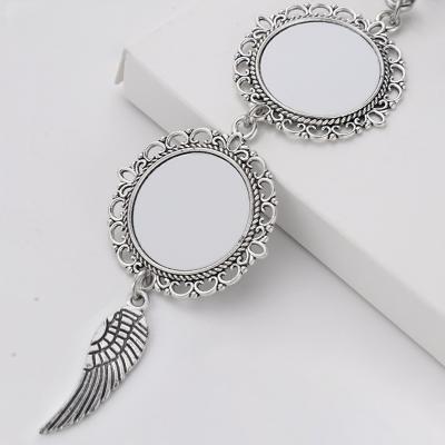 China Sublimation Metal Brooch Custom Print Photo Memorials Angel Wings Memory Charms for sale