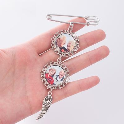 China Sublimatie metalen broche Foto's op maat gedrukt Gedenkstukken Engel vleugels geheugen amuletten Te koop