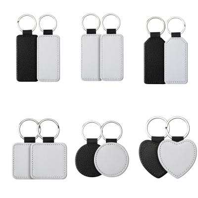 China Custom Leather Keychain Printable Double Sided Sublimation Leather Keychain Blanks for sale