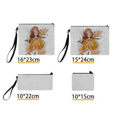 Cina Borsa cosmetica portatile vuota per sublimazione Stampa personalizzata Borsa trucco in lino per sublimazione con cerniera e cinturino da polso in vendita