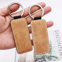 China Waterproof Double Sided Rectangle Sublimation Leather Keychain Blanks for sale