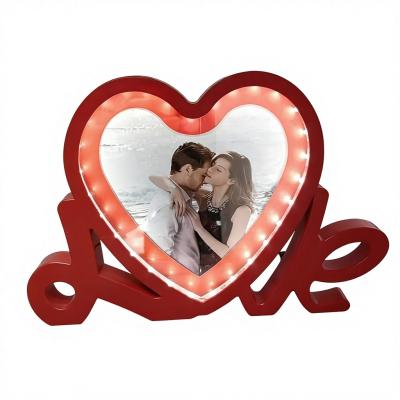 China Home Decoration Plastic Heart Shape Sublimation Blank LED Magic Mirror Photo Frame For Lovers for sale