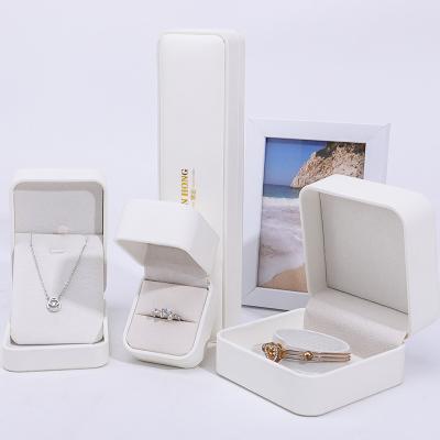China Plain White PU Leather Jewelry Box , Leather Jewelry Case For Ring Pendant Bracelet for sale