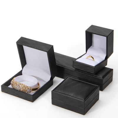 China Beige Lined PU Leather Jewelry Box 2022 Jewelry Package With Custom Printed Ring Box for sale