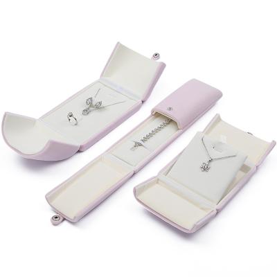 China Tasteful Purple Velvet Jewelry Box Clamshell Shaped Case With Button Closure for sale