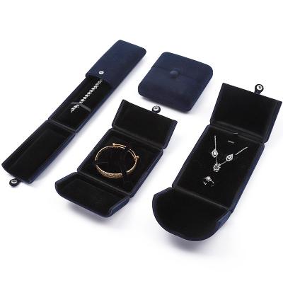 Cina Cina produzione all'ingrosso di alta qualità Scatola per imballaggio di gioielli Scatola personalizzata di lusso per set di gioielli Scatola per collana Bracciale Orecchini Anello imballaggio fatto a mano blu velluto a doppia anta Scatola per gioielli con logo in vendita