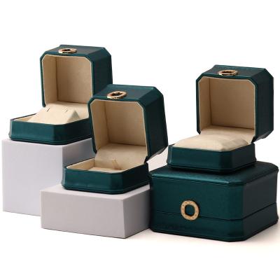 China Dark Green Octagonal PU Leather Jewelry Packaging Box with Ring Ornament for sale