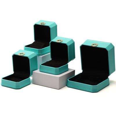 China Octagonal Cyan Ring Ornament PU Leather Jewelry Luxury Packaging Box Organizer for sale