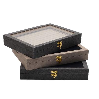 China Multiple Cells Jewelry Display Plate Transparent Cover Leather Jewelry Display Tray for sale