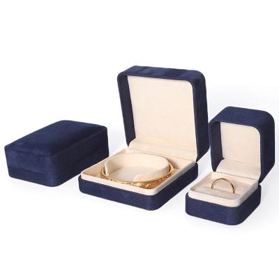 Cina China Manufacturing Wholesale Premium Blu Jewellery Packaging Box Custom Hign End Big Jewelry Set Collare Bracelet Earrings Ring Packaging Handmade Square Velvet Blue Jewelry Box With Logo in vendita