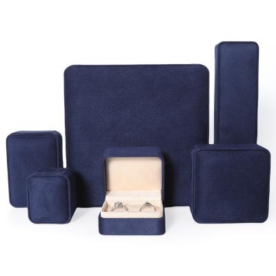 Cina China Manufacturing Wholesale Premium Blu Jewellery Packaging Box Custom Hign End Big Jewelry Set Collare Bracelet Earrings Ring Packaging Handmade Square Velvet Blue Jewelry Box With Logo in vendita