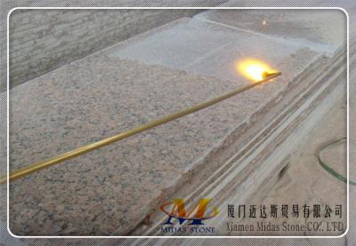 China Flamed G562 Granite Slabs for sale