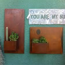 China Garden metal flower pot,rusty small metal flower pot,wall planter for sale