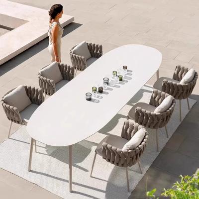 Cina Set da pranzo esterno in stile minimalista nordico Sedie da giardino con design a corda tessuta Patio Tavolo e sedia Combinato per cortile o terrazza in vendita