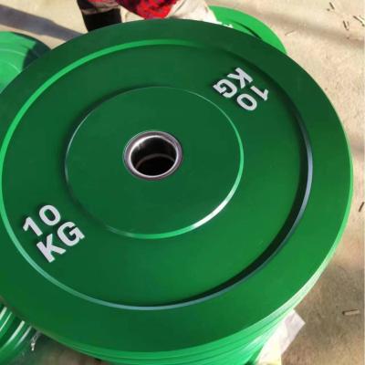 Cina 45 libbre di gomma piastre di peso verde sollevamento pesi piastra paraurti 51mm in vendita