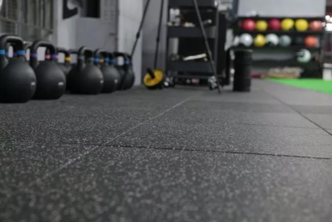 Close-up texture detail of gym rubber flooring