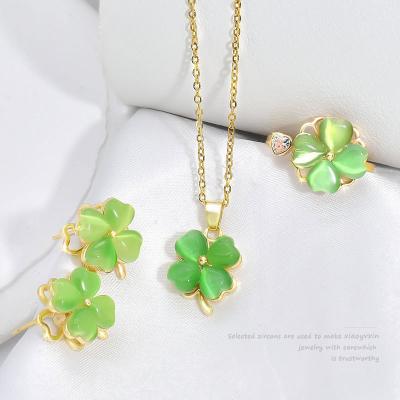 China Popular Rotatable Jewelry Set Green Cats Eye Four Leaf Clover Ring Earrings Necklace Jewelry Set for sale