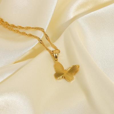 Cina Pendente di sigillo Sunburst per donne Cuore in acciaio inossidabile farfalla Disco di luce solare Choker moneta in vendita