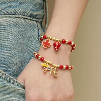 Cina Moda Frutta Cuore Incantesimo Braccialetti a perline Oro Rosso Impermeabile Rame Placcato In Oro Braccialetti a perline Con Incantesimi in vendita