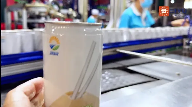 Close-up of sleeve labeling machine components