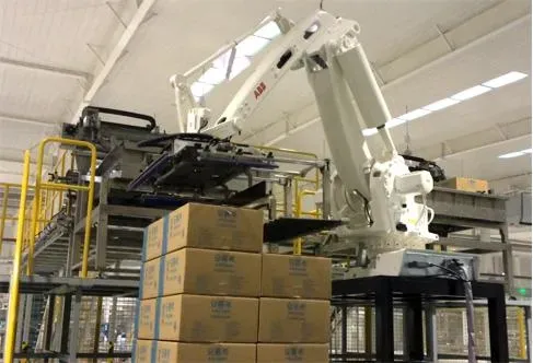 Robot Palletizer loading cartons onto pallet
