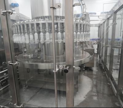 Cina Riempitrice per bottiglie PET ad alta velocità da 36.000 BPH: precisione ed efficienza per moderni impianti di imbottigliamento in vendita