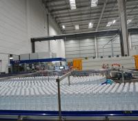 China Dynamic Bottle Buffer Platform 42,000 BPH for Bottled Water Production Robust Motorized Control for sale