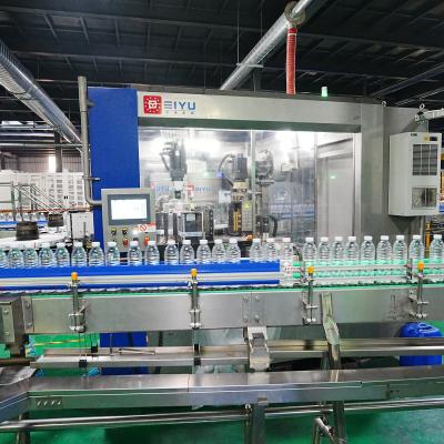 China Máquina de etiquetado de pegamento lineal de fusión en caliente para botellas de PET de 500 ml en venta