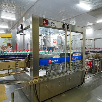 Cina 24000BPH Macchina di etichettatura adesiva con sistema di alimentazione a rotoli multipli in vendita