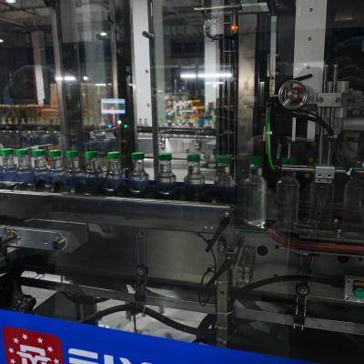 中国 完全自動缶袖ラベル付け機械は ワークショップで試験され インドネシアに輸出されました 販売のため