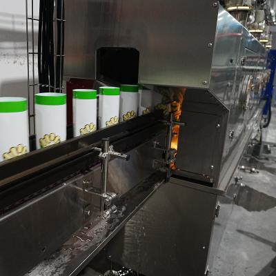 China Se está probando en el taller la línea de producción de bebidas de quinta generación de aplicación de manga de contracción totalmente automática personalizada para 30000BPH en venta