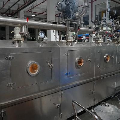 China Se está probando en el taller la línea de producción de bebidas de quinta generación de aplicación de manga de contracción totalmente automática personalizada para 30000BPH en venta