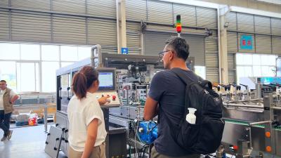 China American Ice Cream Customers Watch The Video Of Case Packing Equipment Running On Site for sale