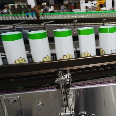 中国 ボトル缶用の自動袖ラベル機 9000-72000bph 販売のため