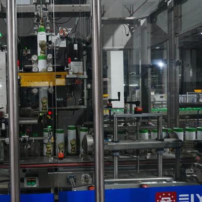 China Automatic Sleeve Labeling Machine 32000 BPH for Bottles and Cans for sale