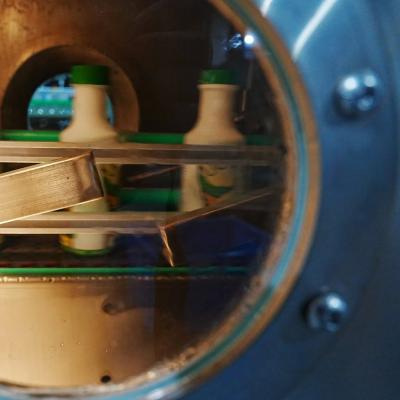 China Automatic Single Head Sleeving Machine 42000 BPH for Bottles for sale